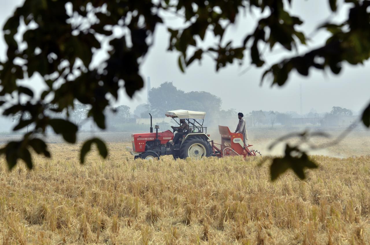 Agriculture_in_India_tractor_farming_Punjab_preparing_field_for_a_wheat ...